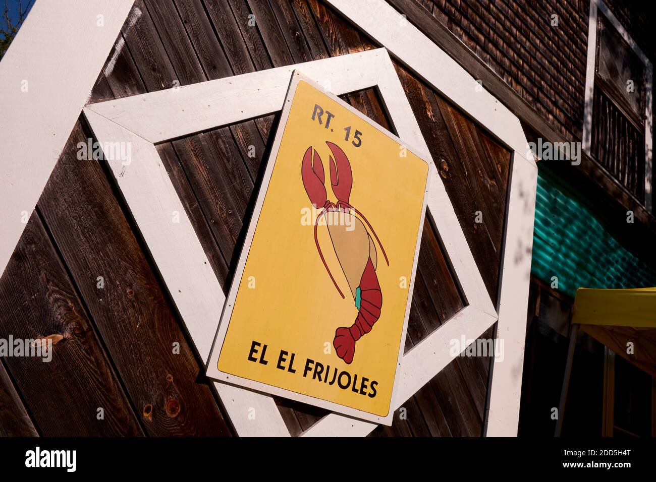 The sign on a classic cedar shingle barn for El El Frijoles, a Mexican ...