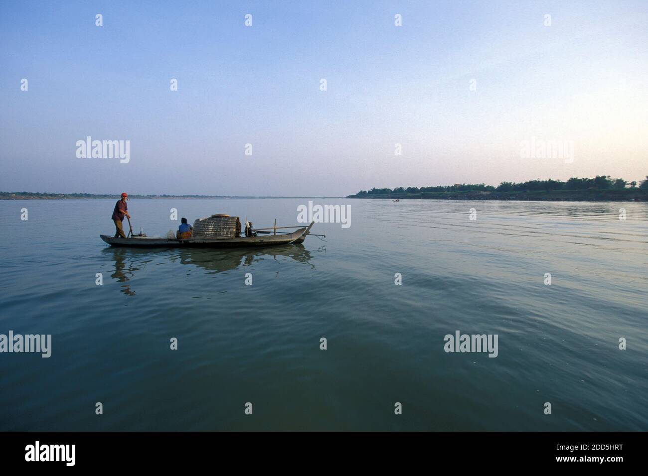 a fishing boat on the Mekong river at the village of Kampong Cham in ...