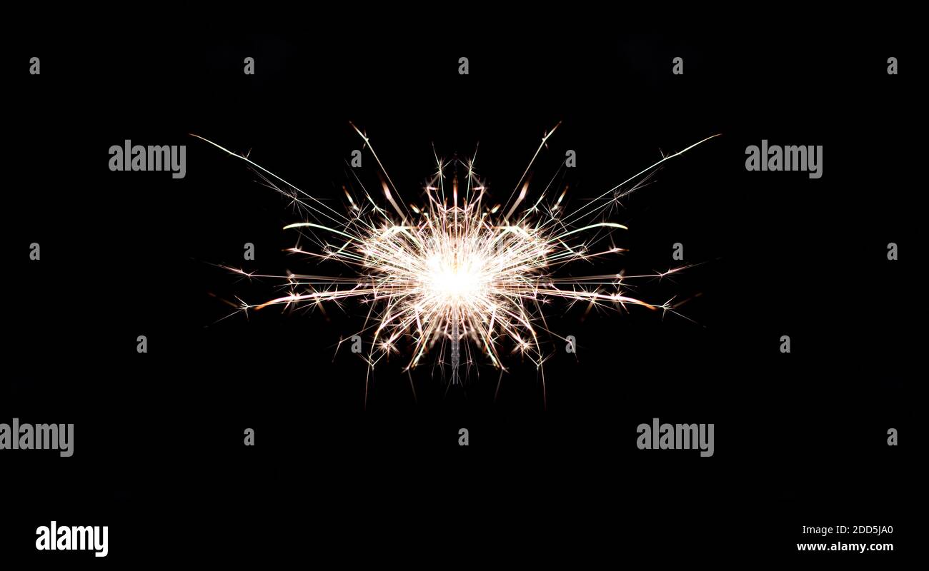 Bengal symmetric fire on a black background Stock Photo - Alamy