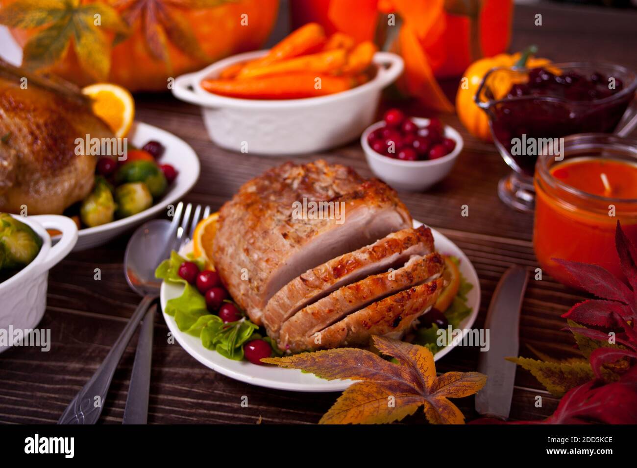 Traditional sliced honey glazed ham for festive Christmas or ...
