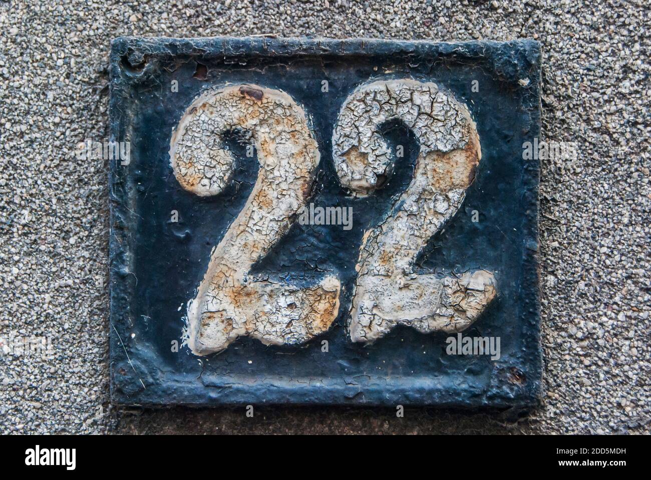 Old retro weathered cast iron plate with number 22 closeup Stock Photo ...