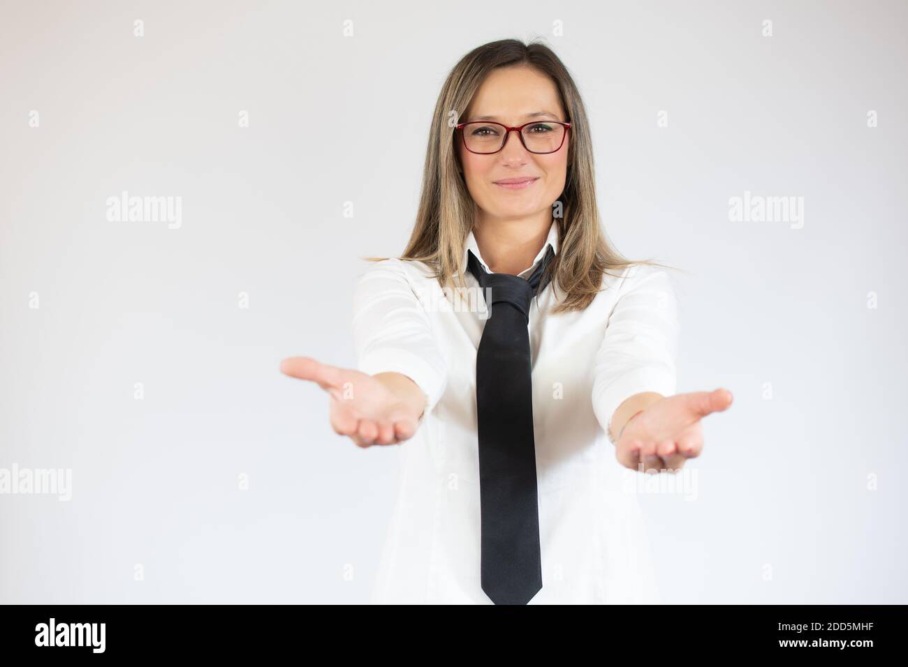 Young business woman over isolated white background inviting to come ...
