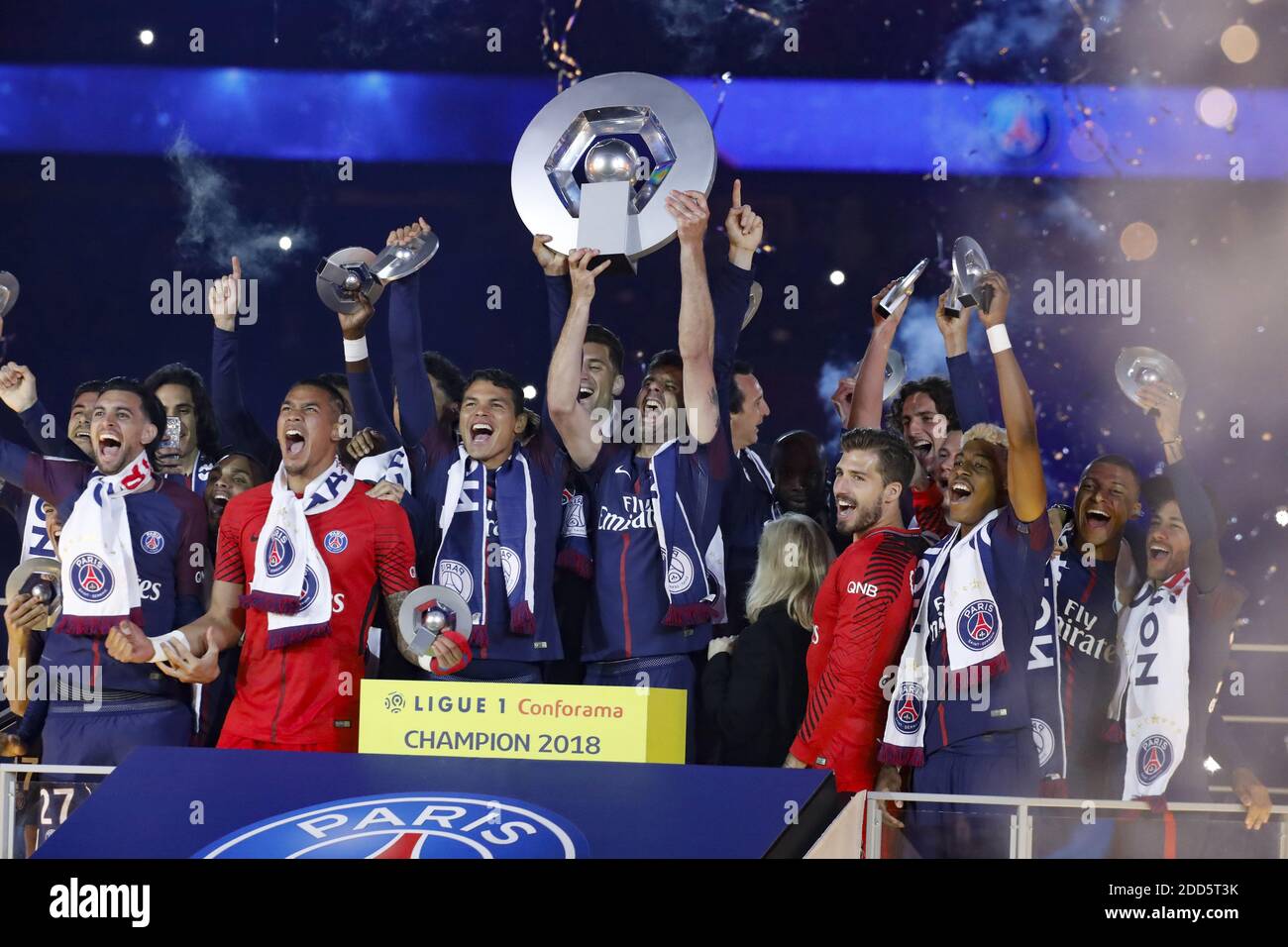 PSG's team receiving the Hexagonal Trophy for Champion of France after ...