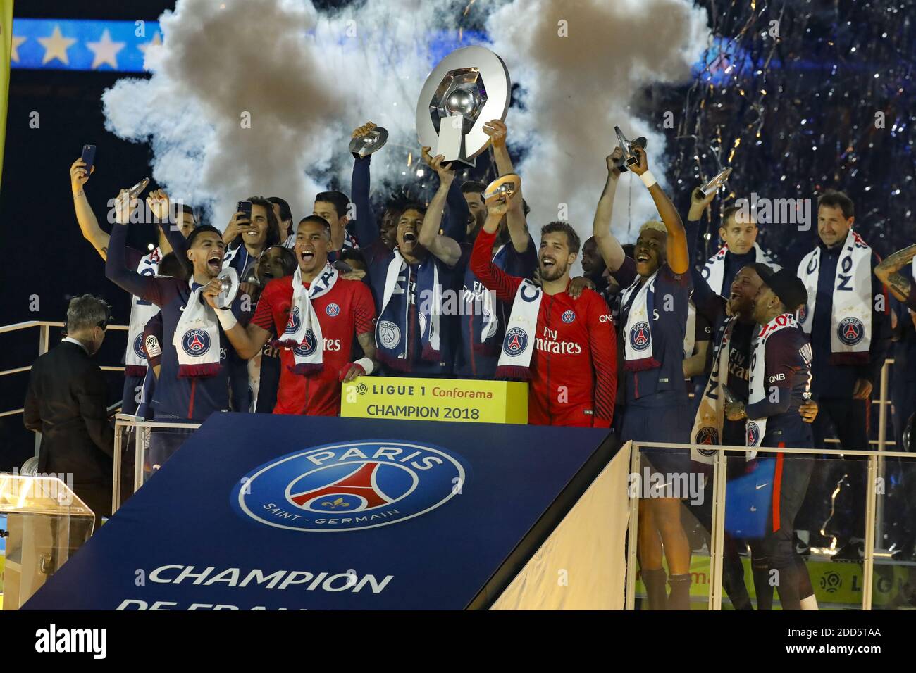 PSG's team receiving the Hexagonal Trophy for Champion of France after ...