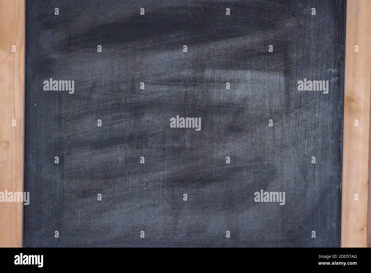 Black chalkboard erased with eraser Stock Photo - Alamy
