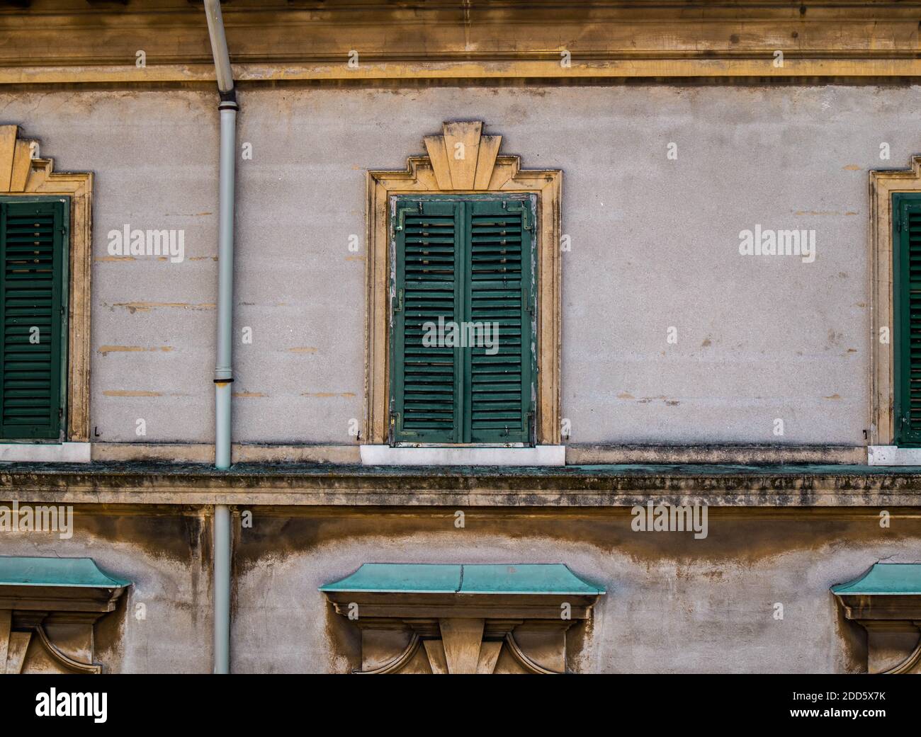 Beautiful European apartment buildings with green window slats Stock ...