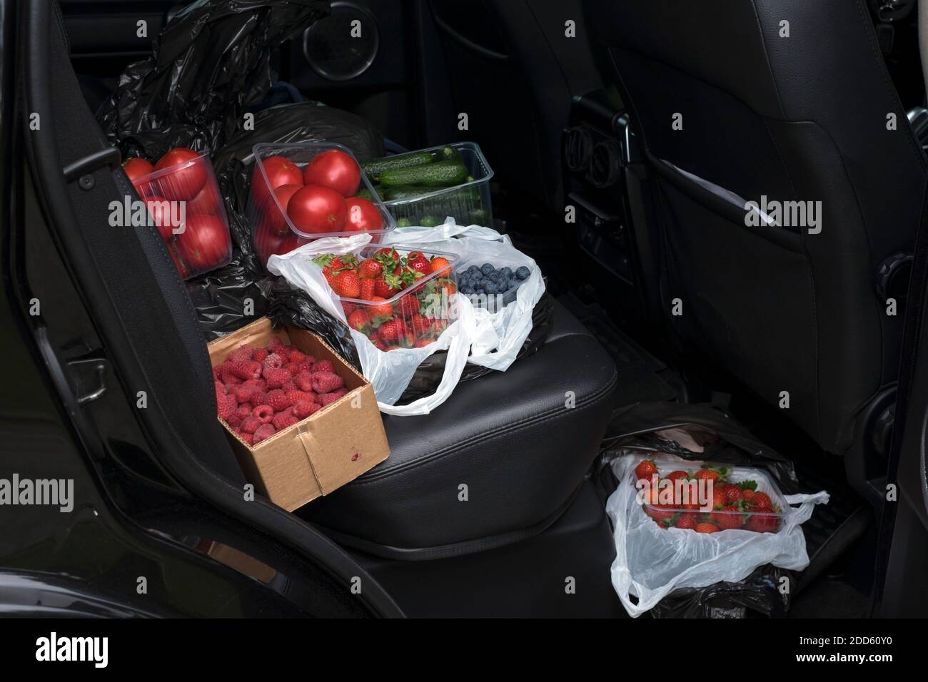 fruits and vegetables on a car backseat, outdoor cropped shot Stock ...