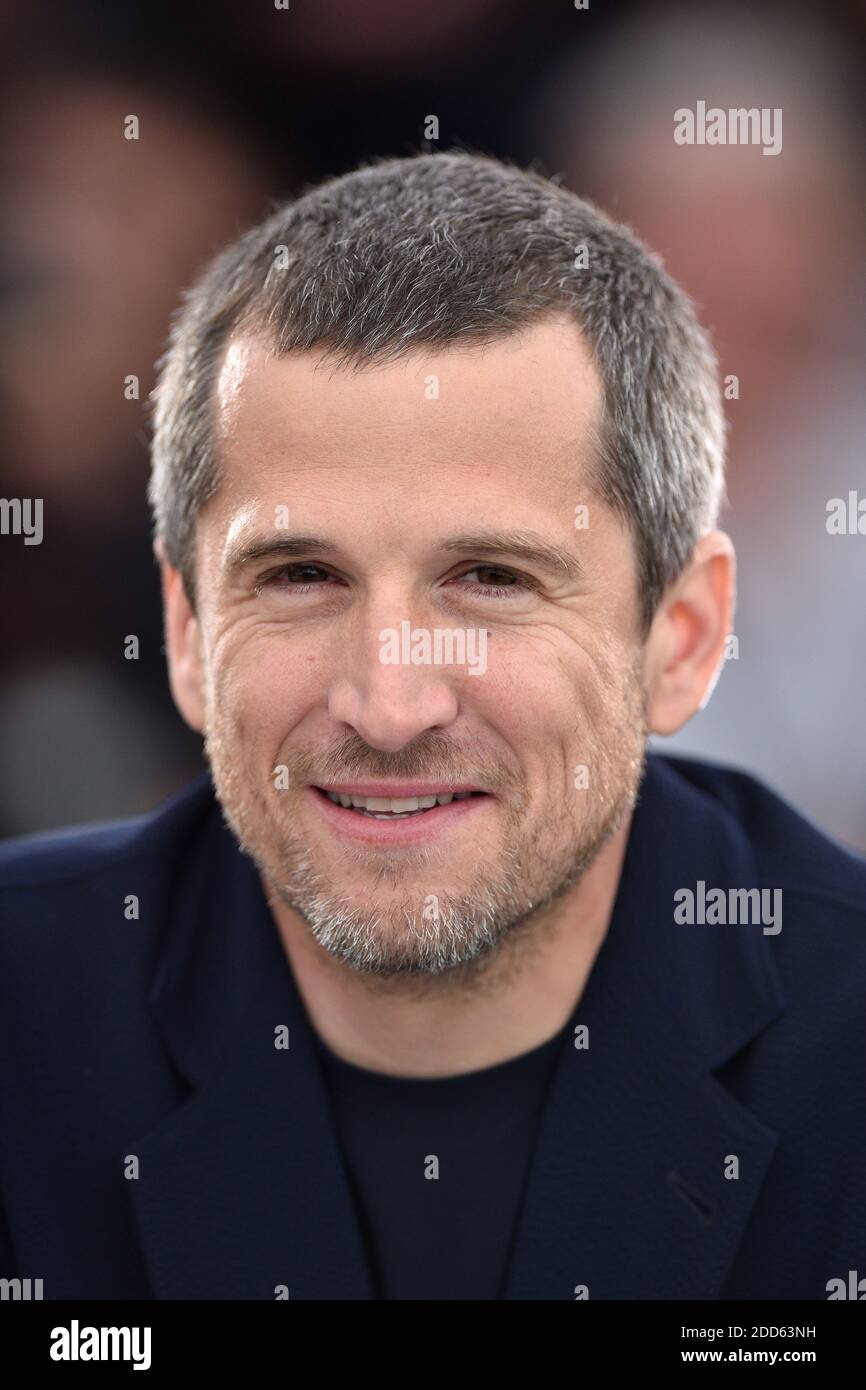 Guillaume Canet posing at the Le Grand Bain photocall held at the ...