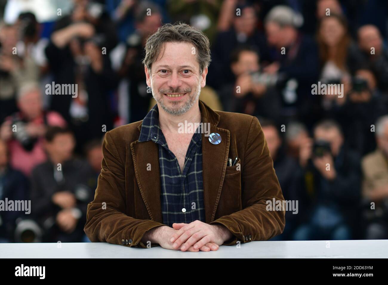 Mathieu Amalric posing at the Le Grand Bain photocall held at the ...