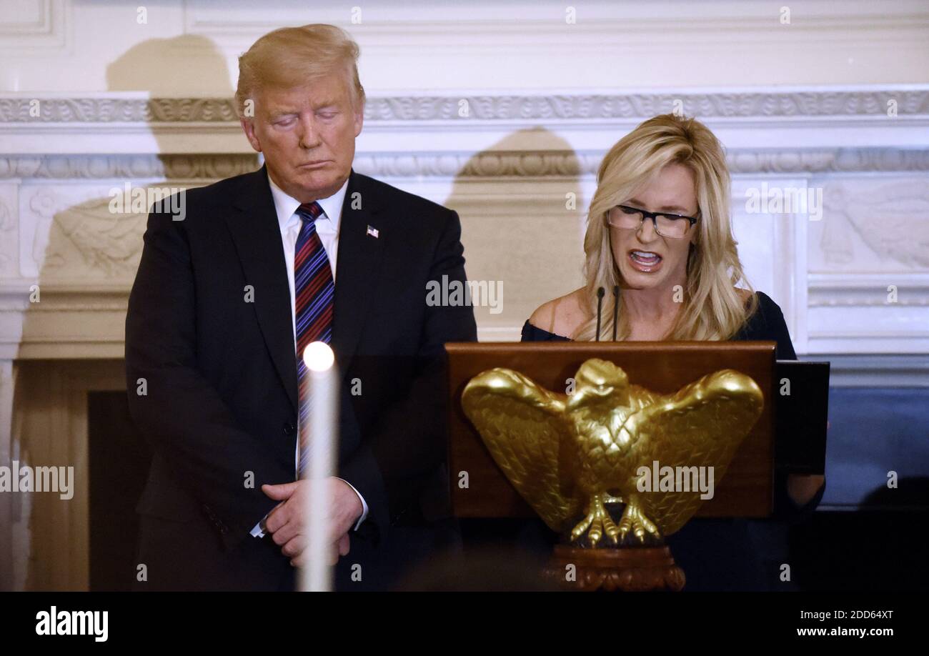 U.S. President Donald Trump listens to Evangelist and Pastor, Paula ...
