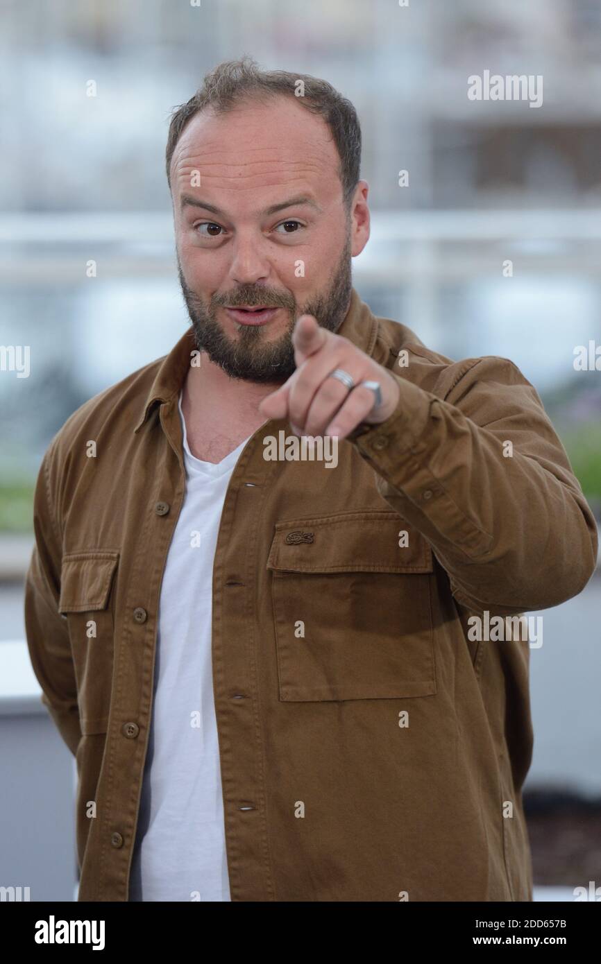 Alban Ivanov posing at the Le Grand Bain photocall held at the Palais ...