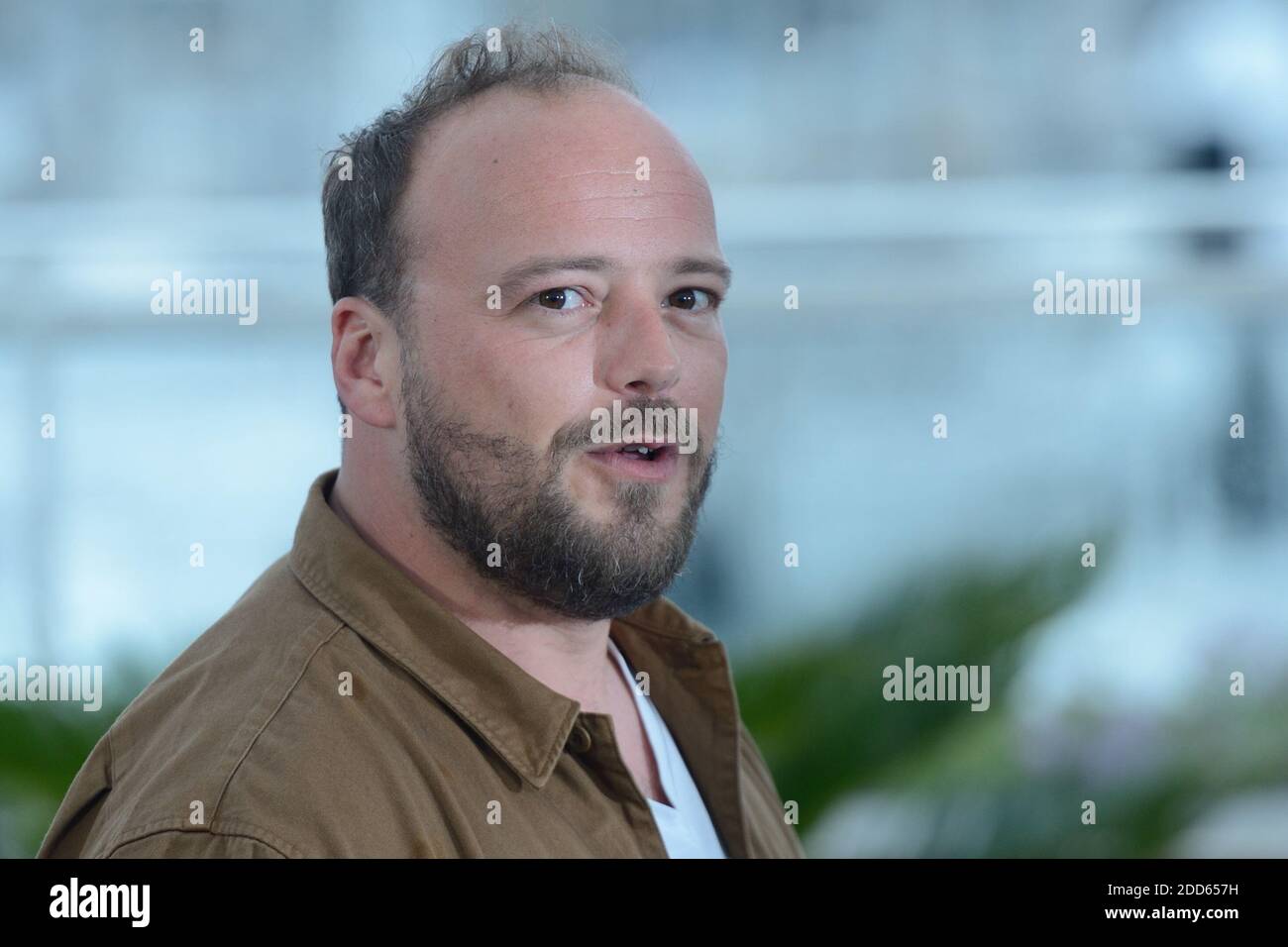 Alban Ivanov posing at the Le Grand Bain photocall held at the Palais ...
