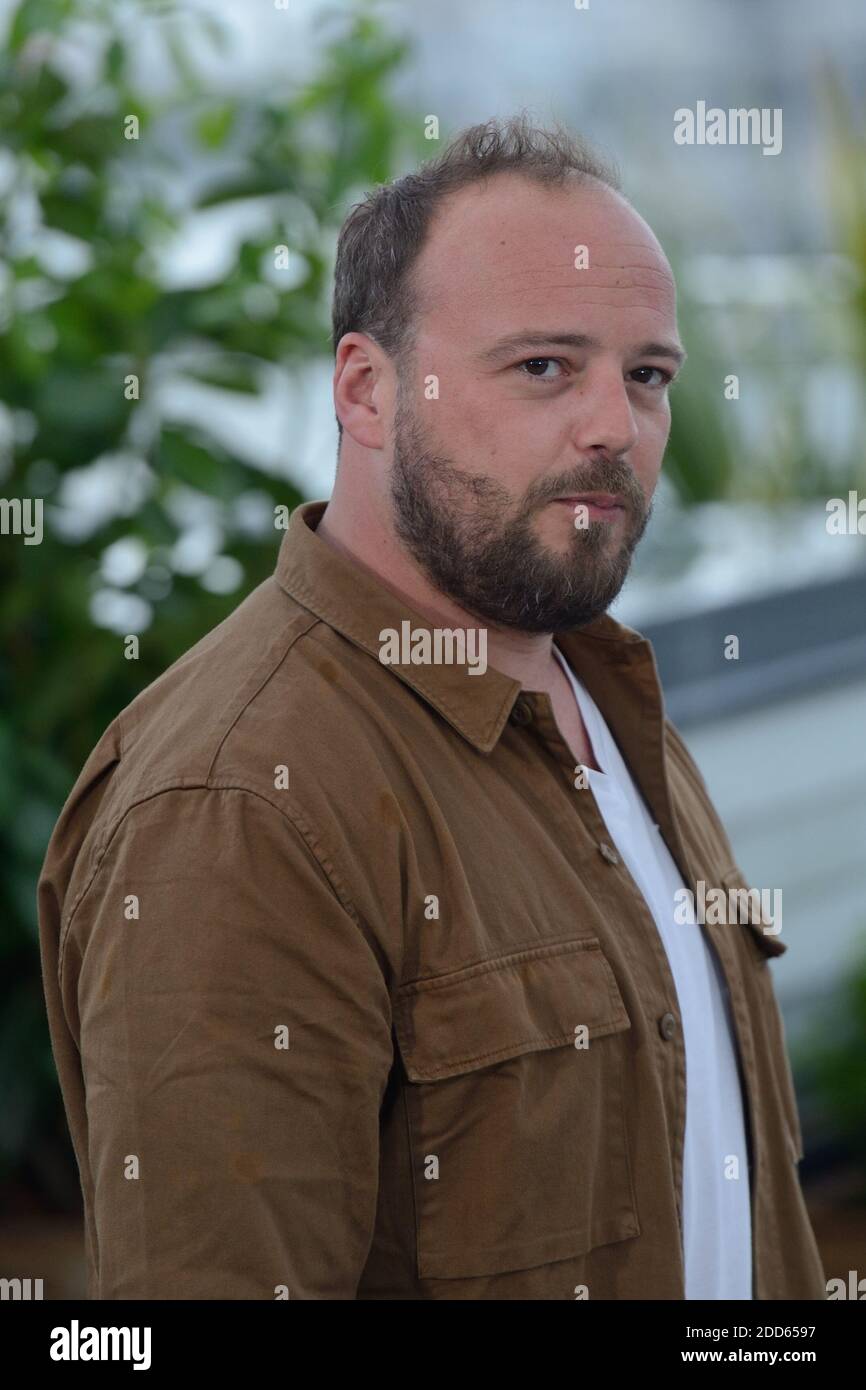 Alban Ivanov posing at the Le Grand Bain photocall held at the Palais ...