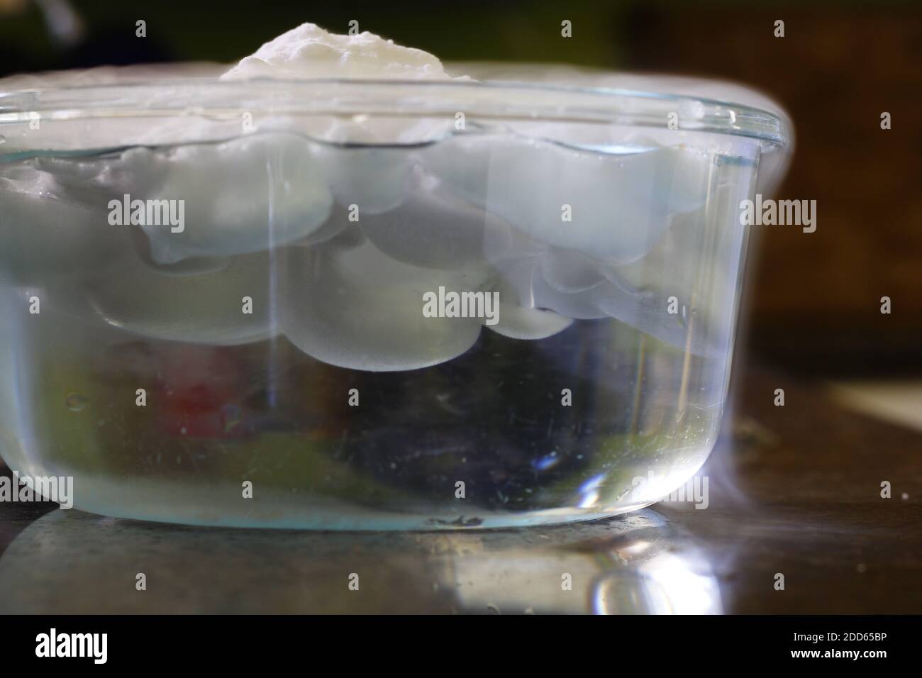 Dry Ice in a Bowl of Water Stock Photo - Alamy