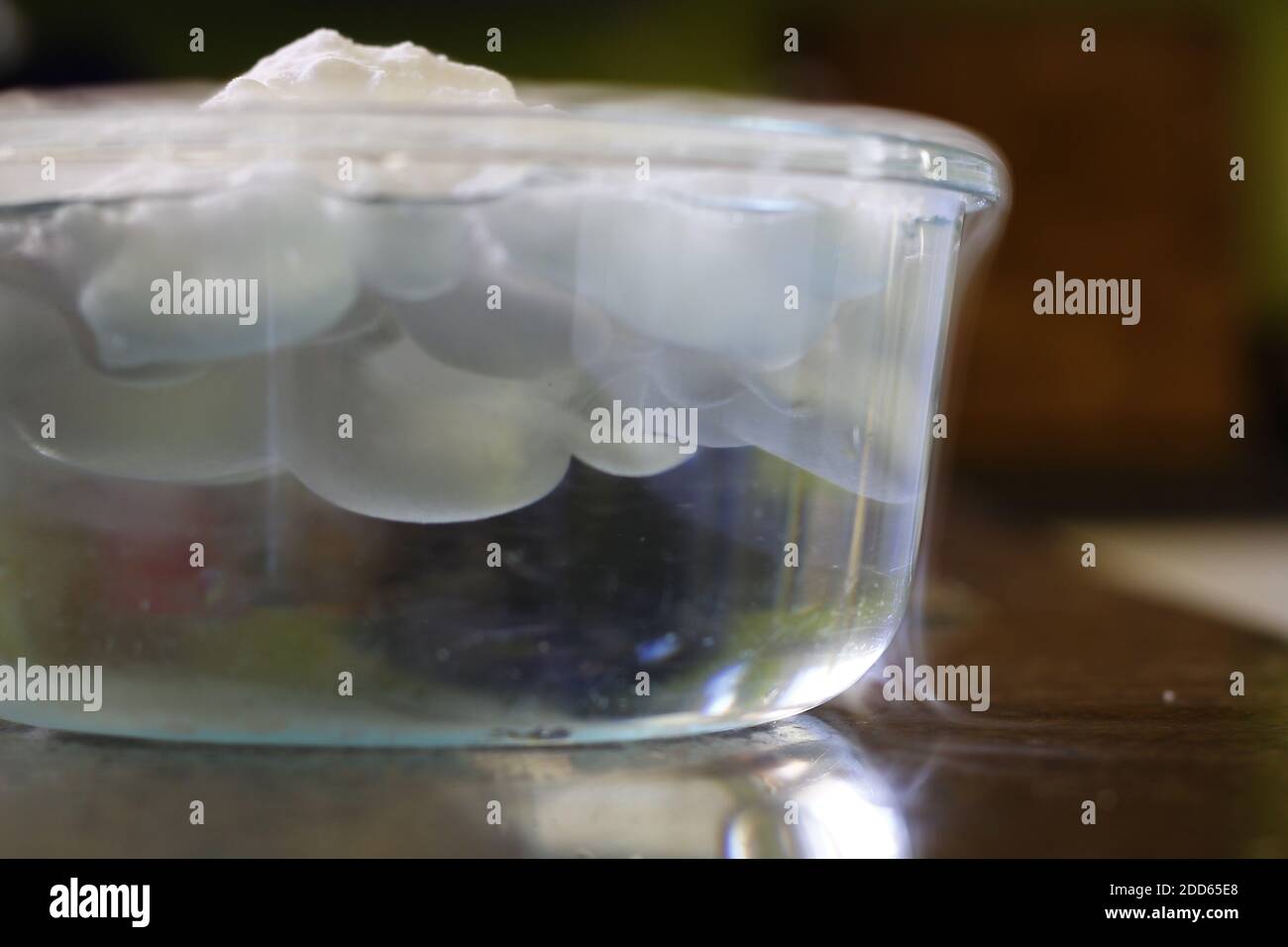 Dry Ice in a Bowl of Water Stock Photo - Alamy