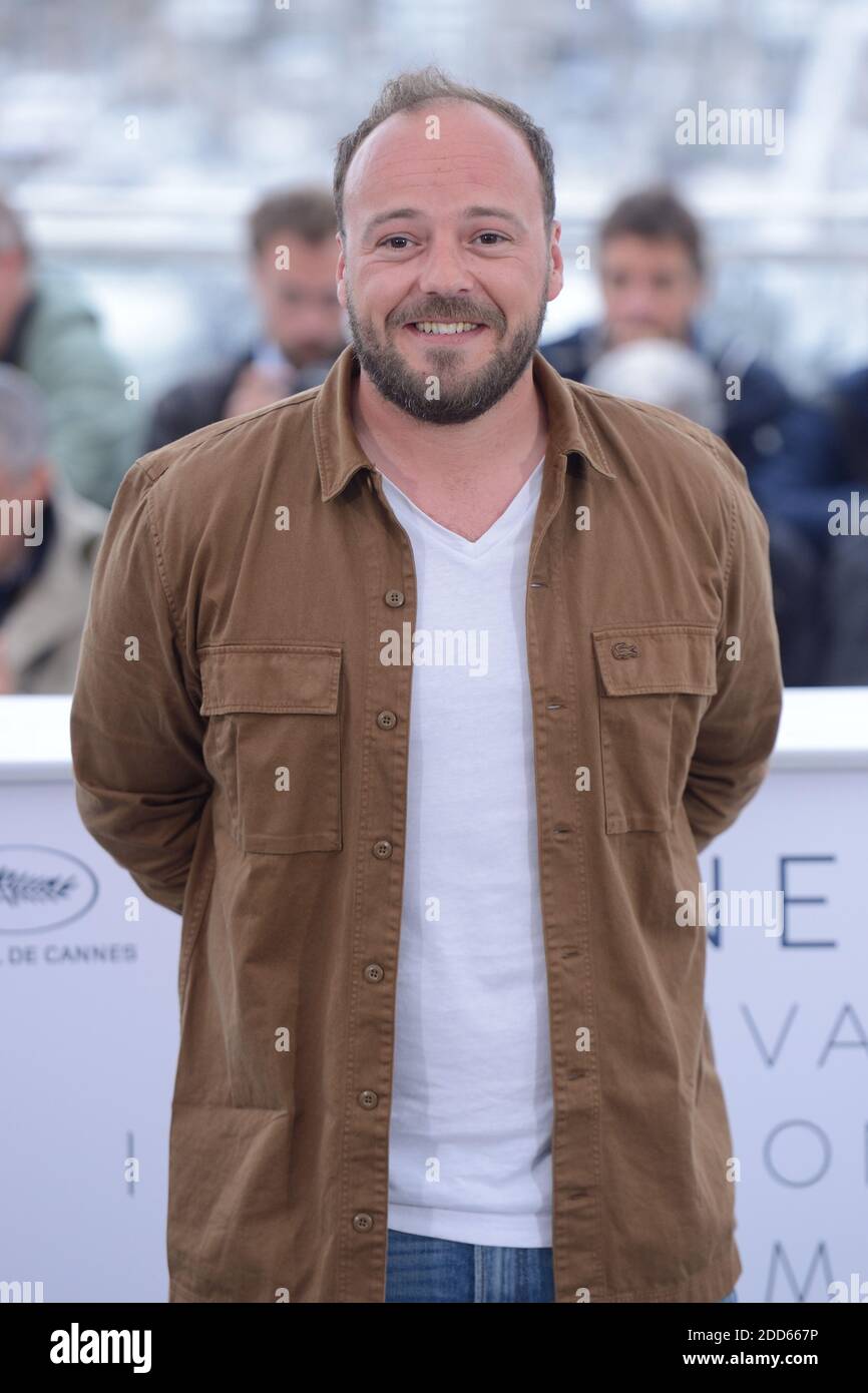 Alban Ivanov posing at the Le Grand Bain photocall held at the Palais ...