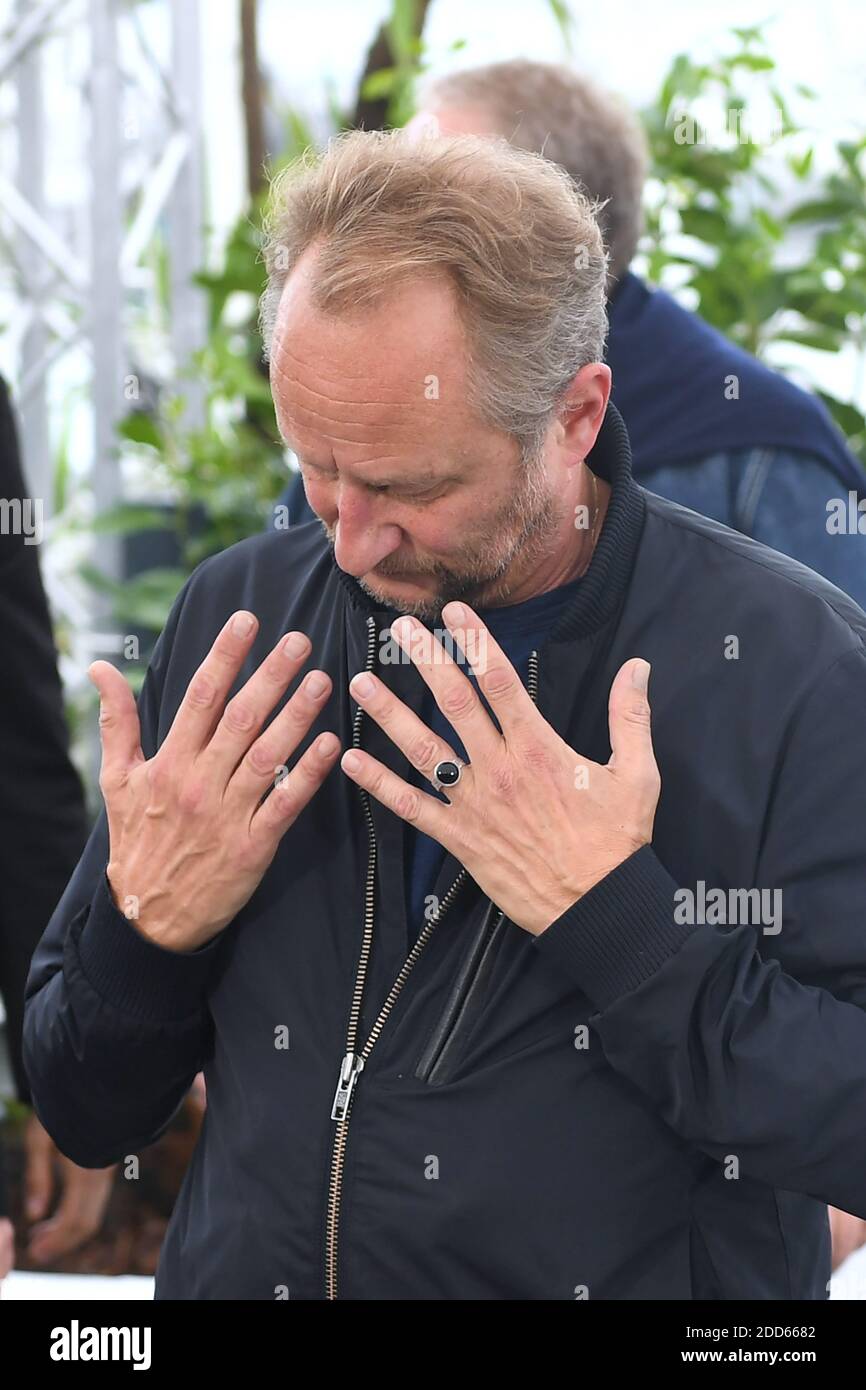 Benoit Poelvoorde posing at the Le Grand Bain photocall held at the ...