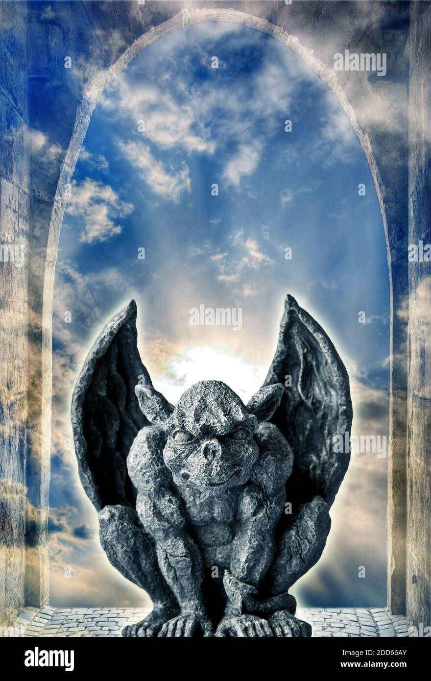 winged Gargoyle statue and magic gate Stock Photo - Alamy