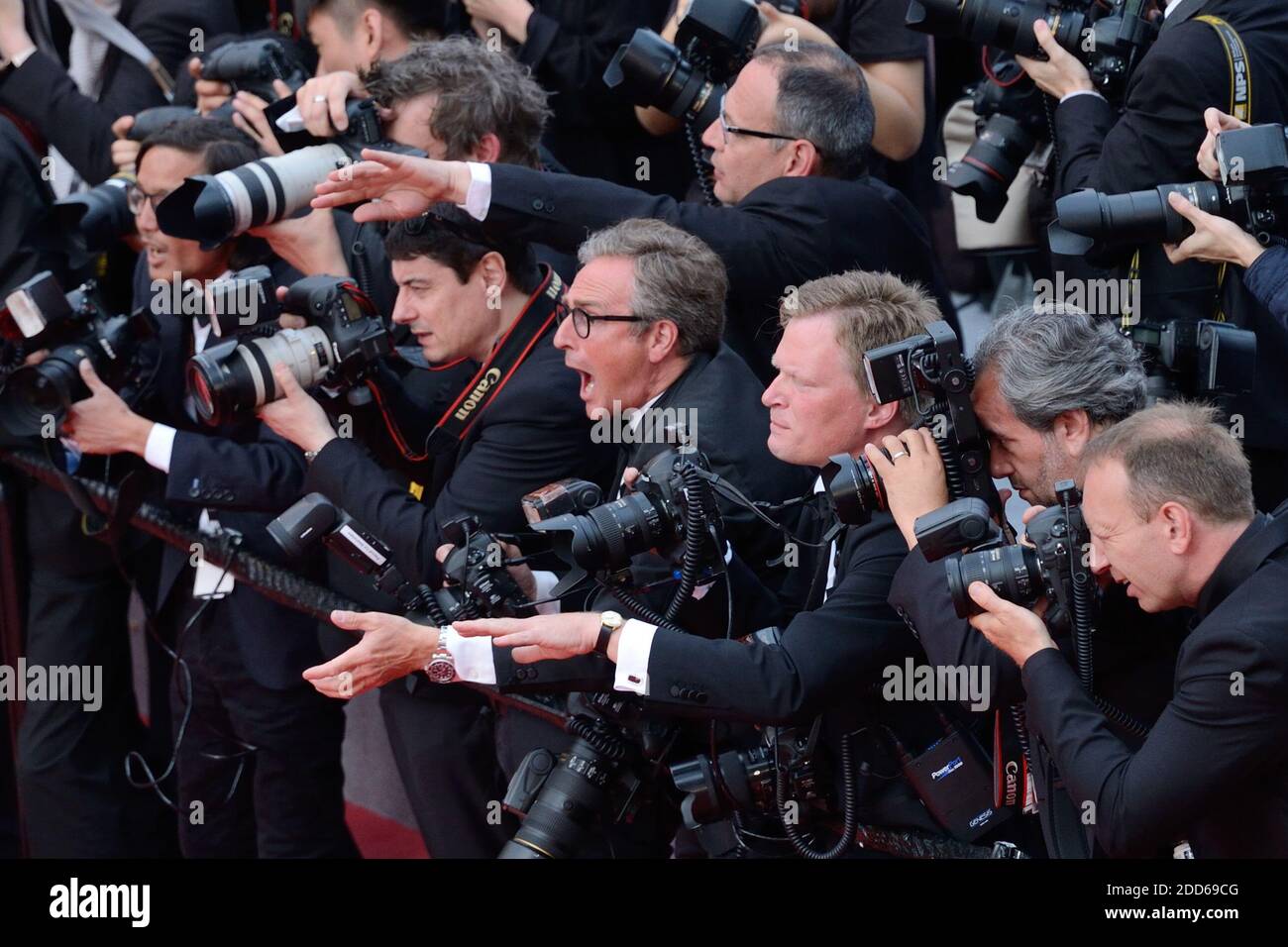 Photographers shooting during the Le Grand Bain Premiere held at the ...