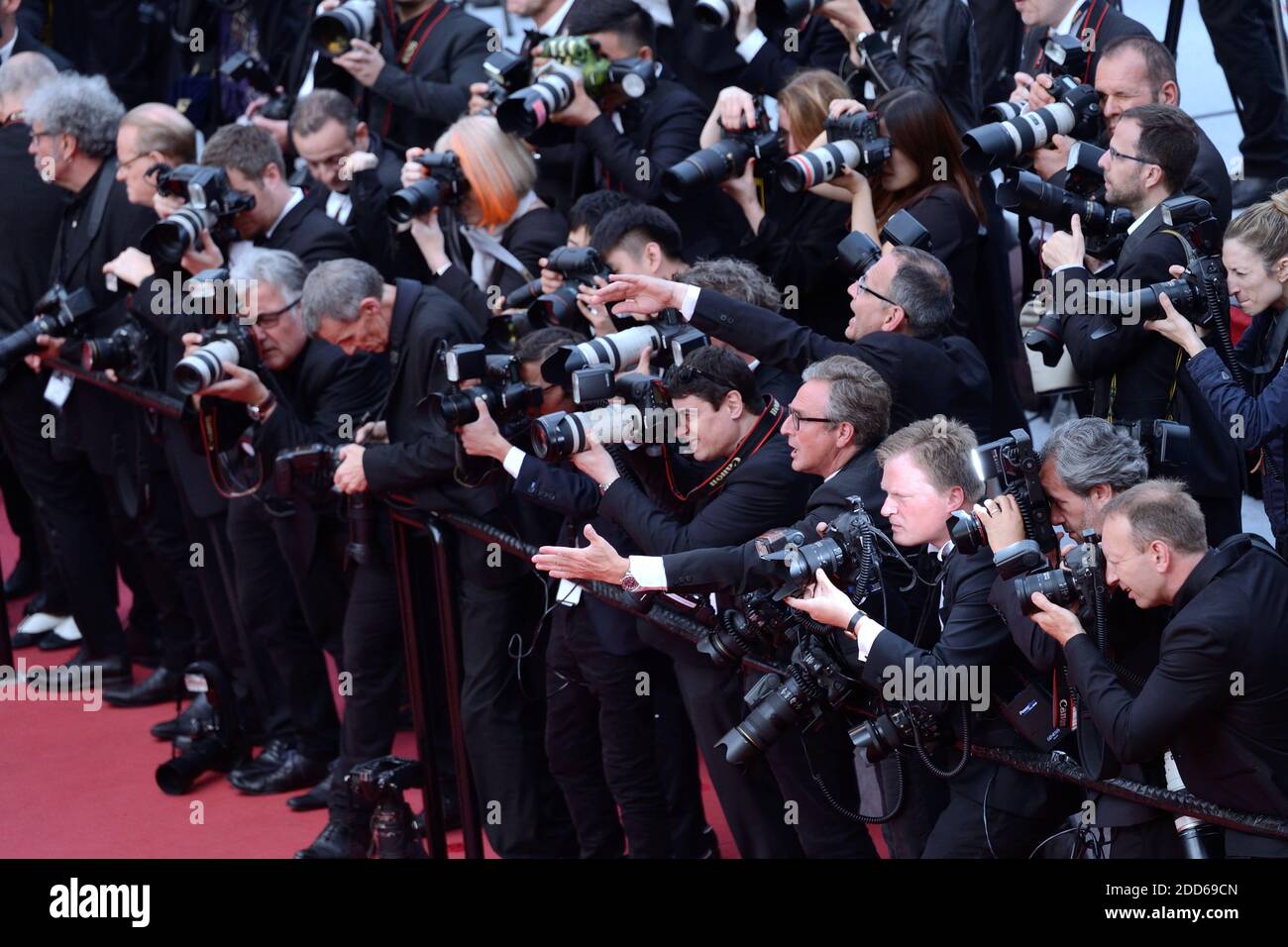 Photographers shooting during the Le Grand Bain Premiere held at the ...