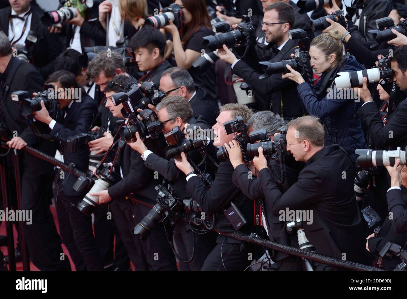 Photographers shooting during the Le Grand Bain Premiere held at the ...