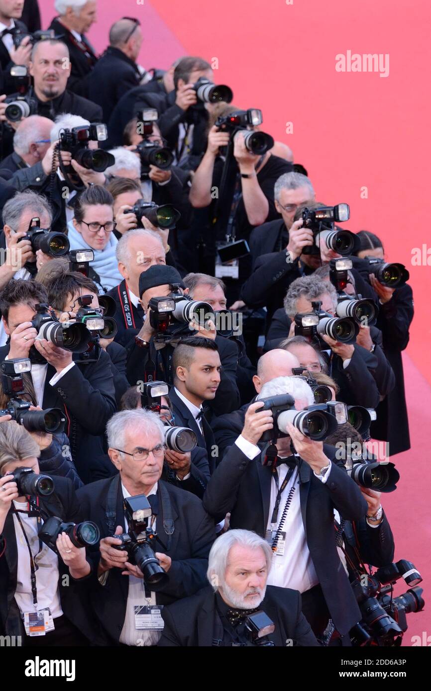 Photographers shooting during the Le Grand Bain Premiere held at the ...