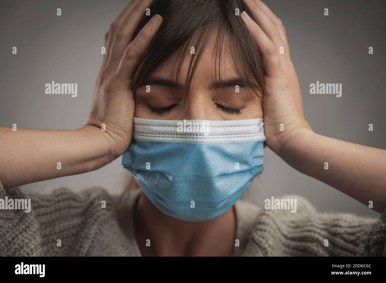 Woman worried and stressed about being infected with Covid-19 Stock ...