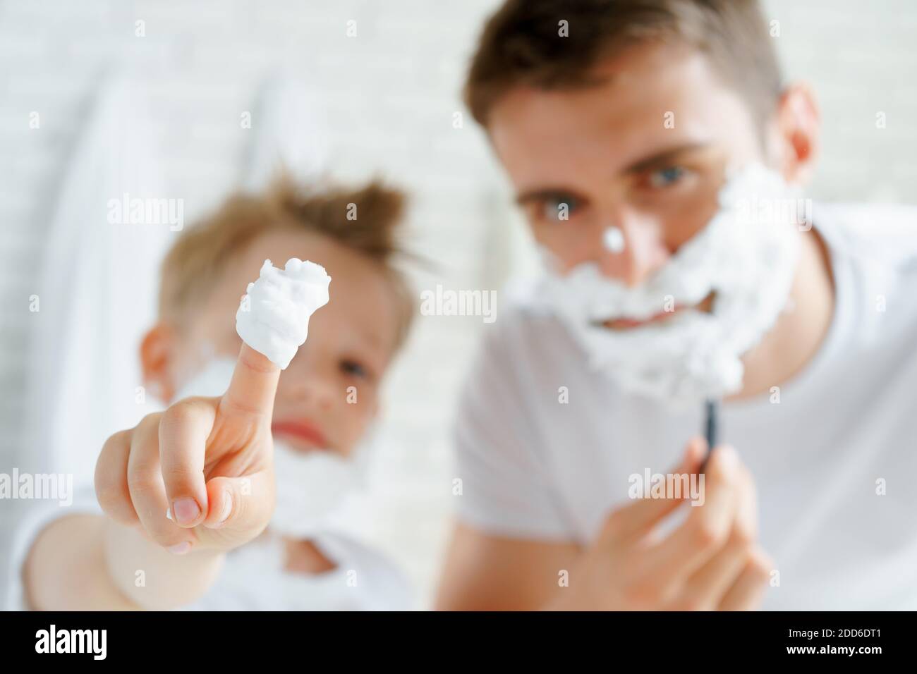 Father and his little son shaving together Stock Photo - Alamy