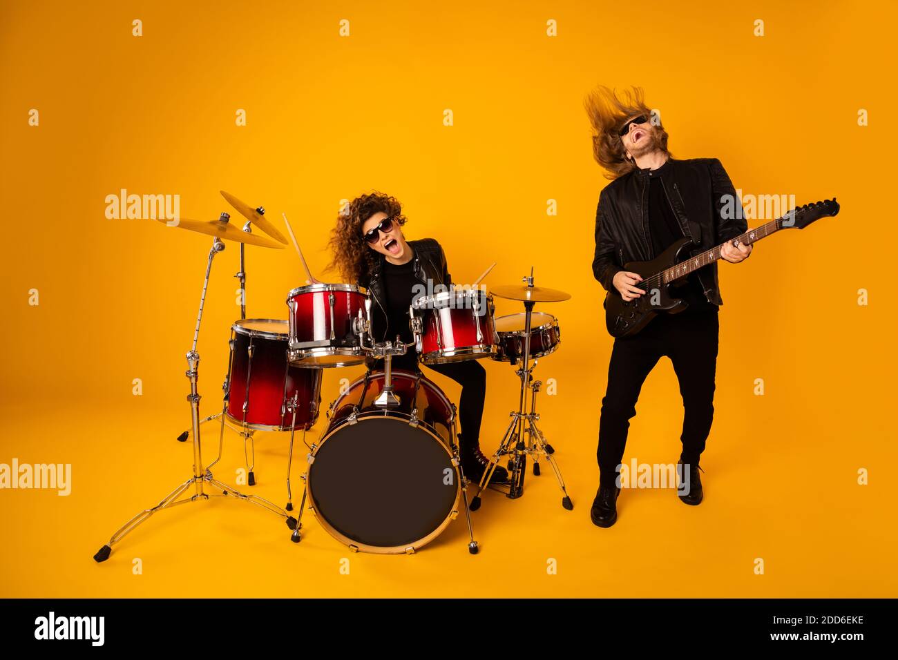 Popular punk band live show performance. Full size photo of two people ...