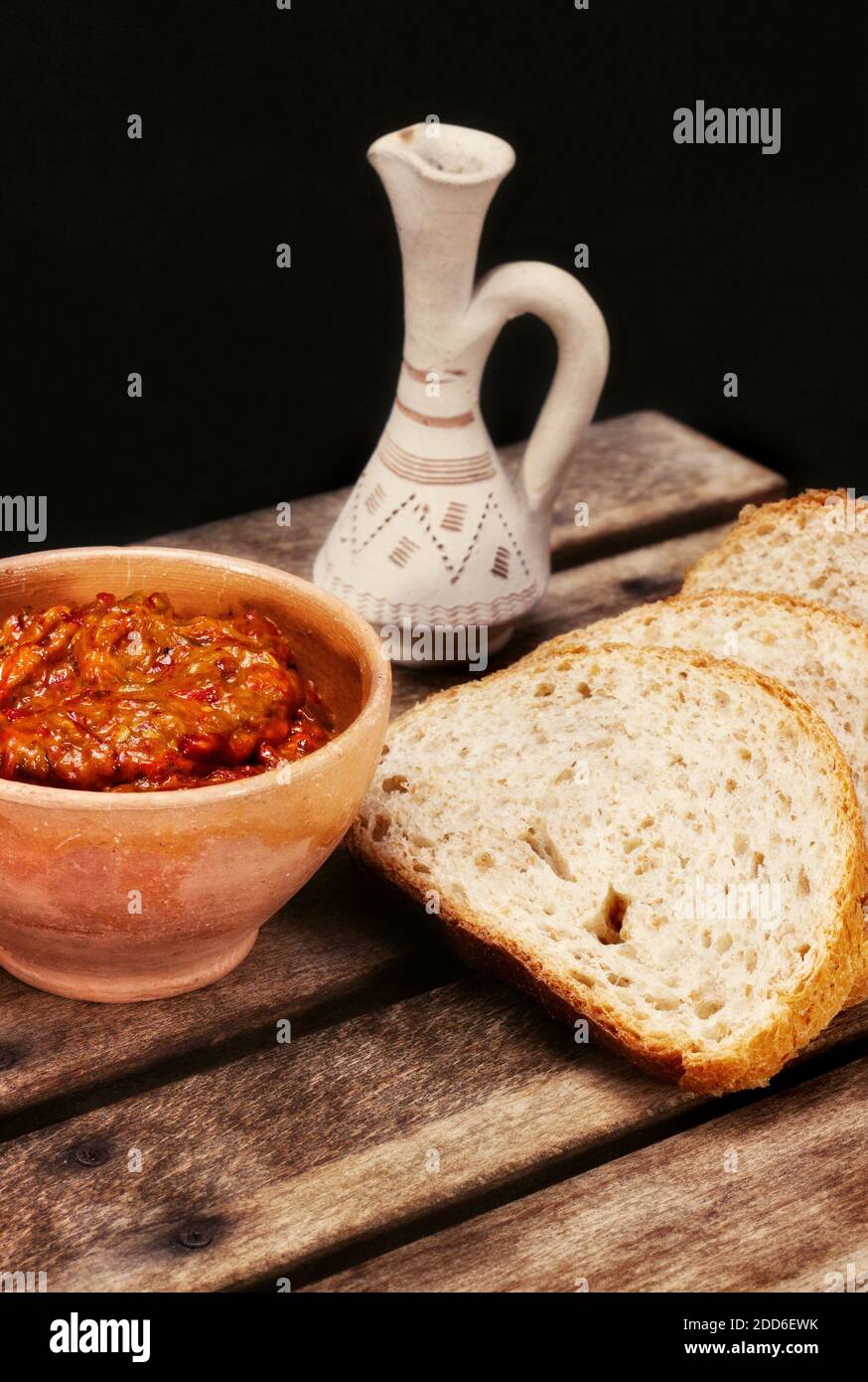 Traditional macedonian meal - ajvar served with bread and rakija Stock ...