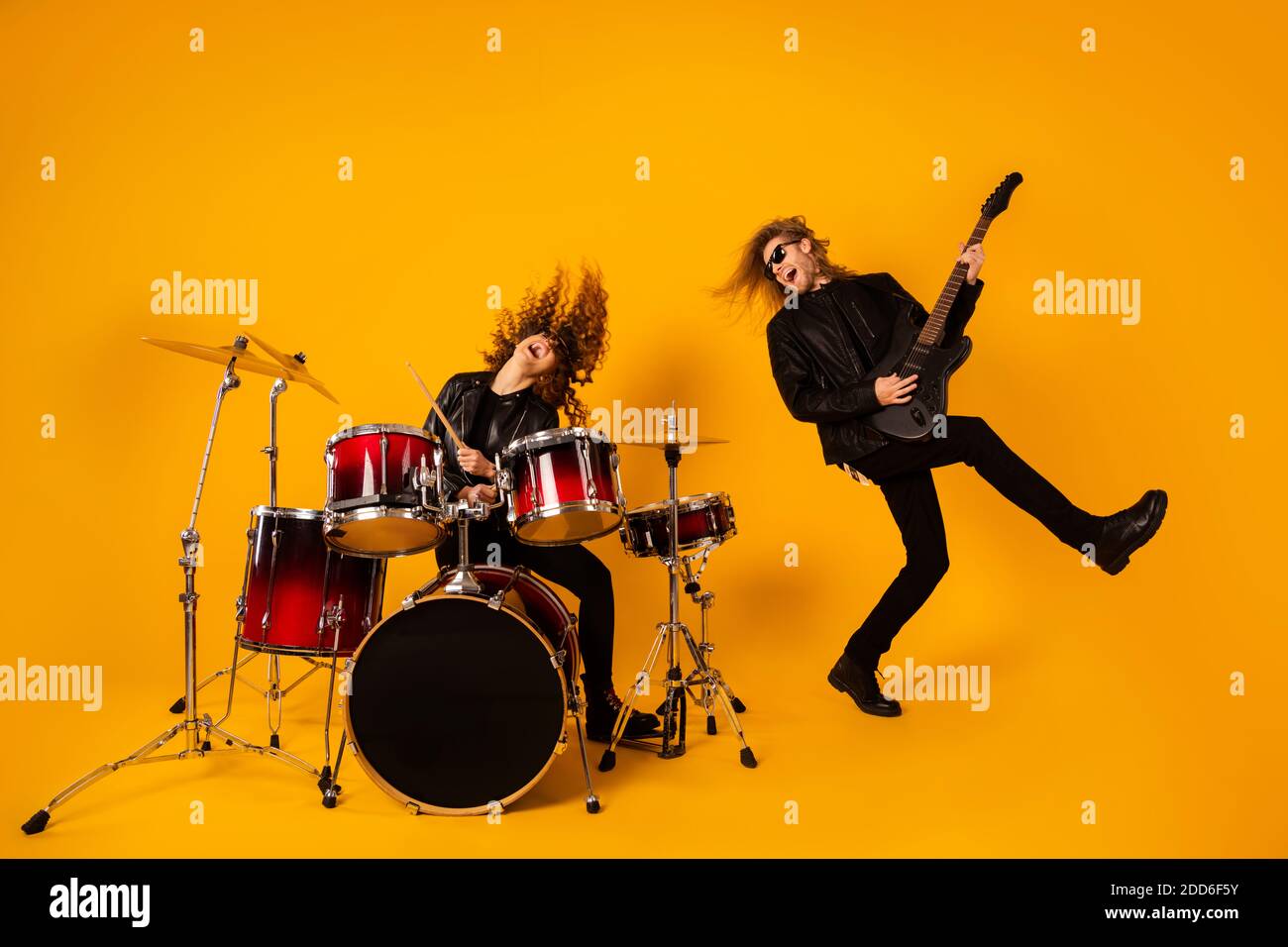 Full body two people famous artist punk band have studio recording ...