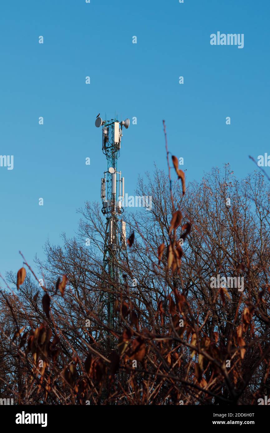 Cell phone tower. Wireless mobile antenna. Network communication radio ...