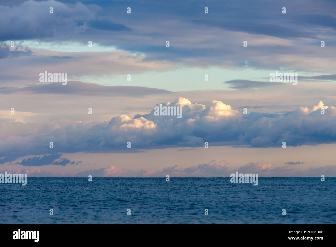 beautiful clouds, cloudscape over the ocean, seascape, shades of blue ...