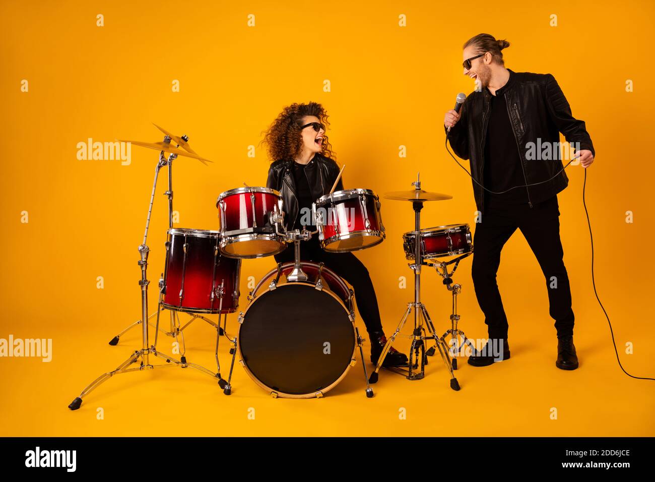 Full body photo of famous rock group cool lady plays instruments drum ...