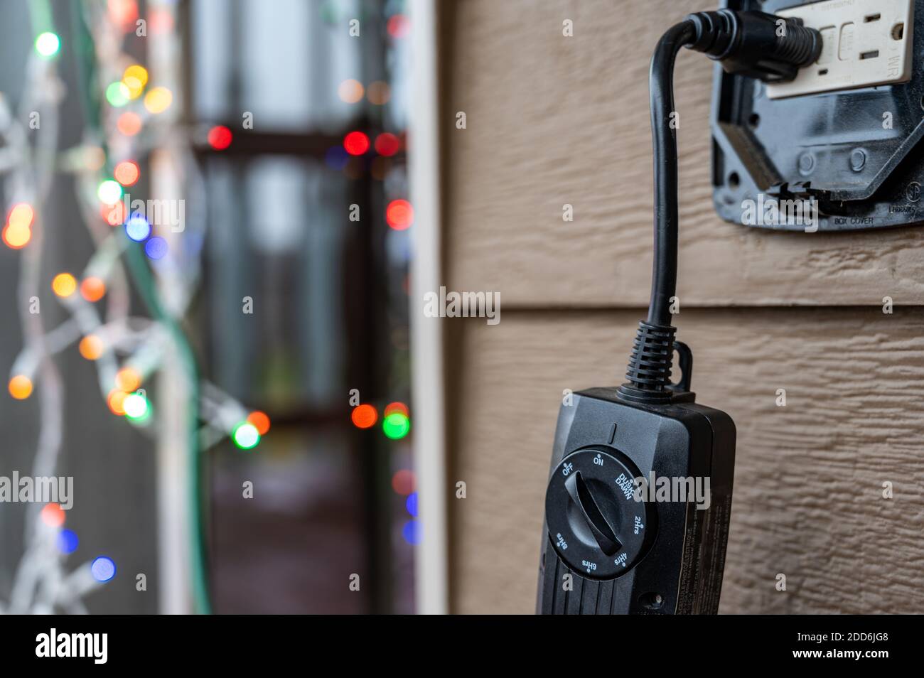 Outdoor setup and installation of Christmas decorations using a timer ...