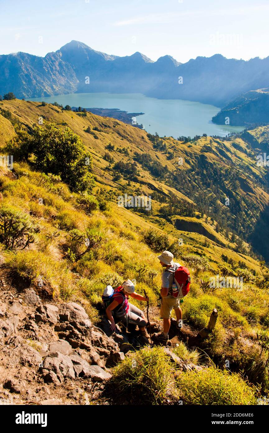 Tourists Take a Break on the Challenging Three Day Mount Rinjani Trek ...