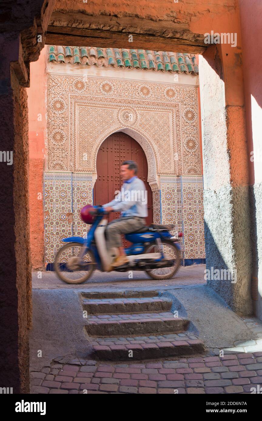 Moped riding backstreet hi-res stock photography and images - Alamy