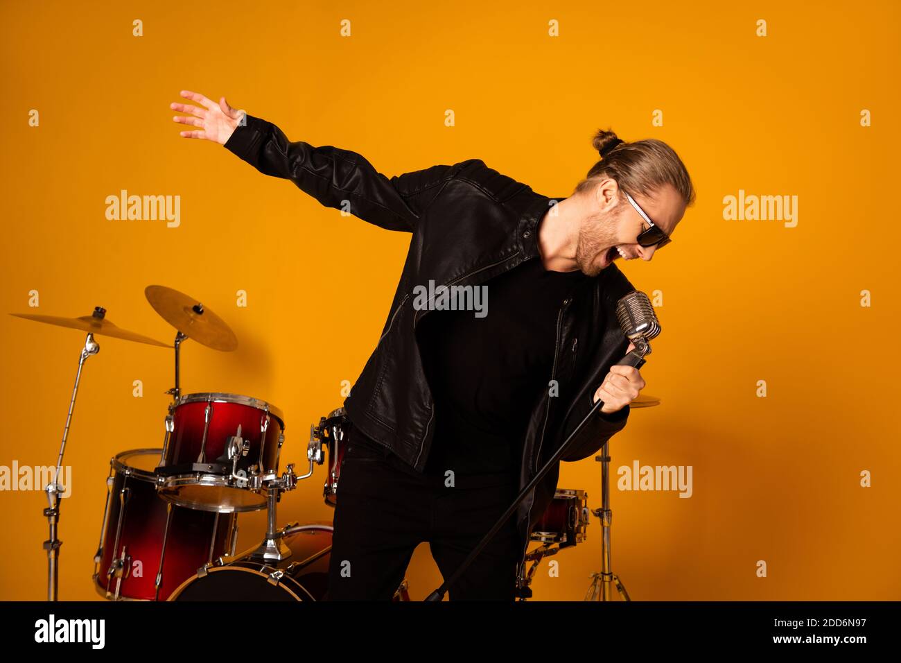 Photo of cool handsome vocalist guy singing retro old fashion ...