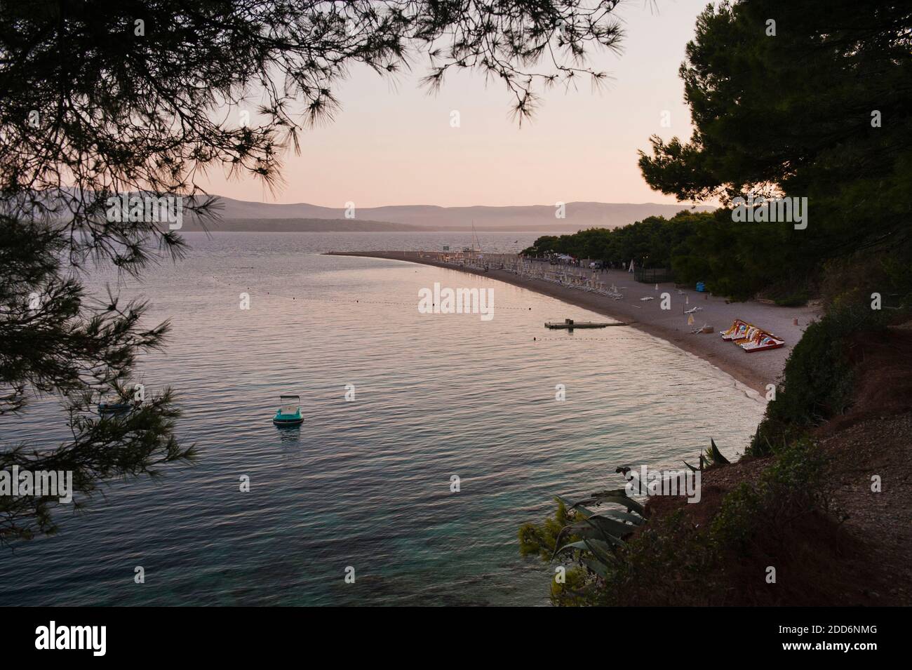 Photo of Zlatni Rat Beach at sunset, Bol, Brac Island, Dalmatian Coast ...