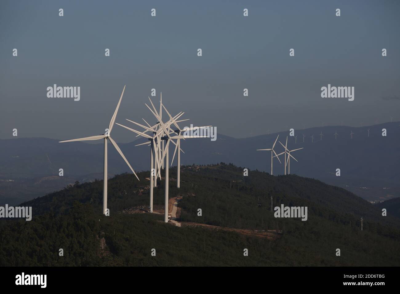 Wind Turbines in Hilly terrain Stock Photo - Alamy