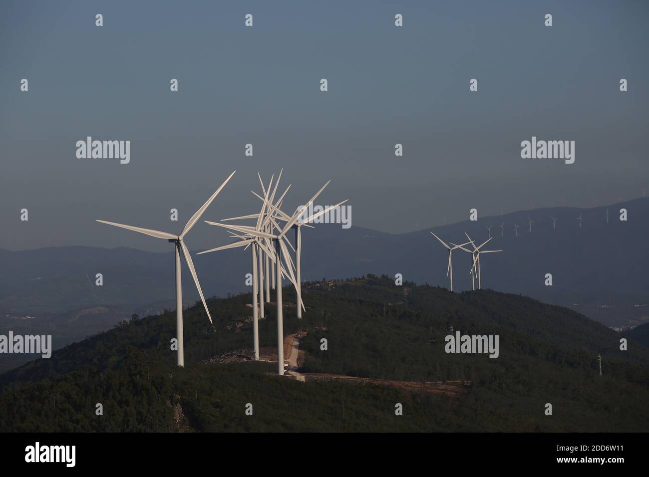 Wind Turbines in Hilly terrain Stock Photo - Alamy