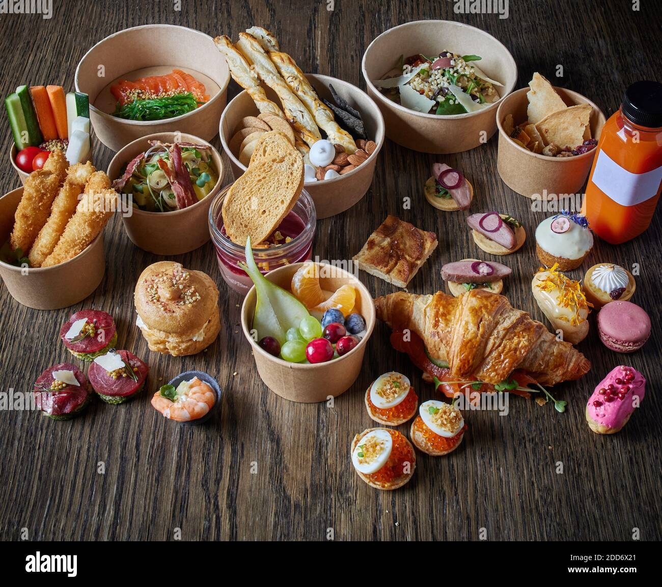 various restaurant take away food on wooden table Stock Photo - Alamy