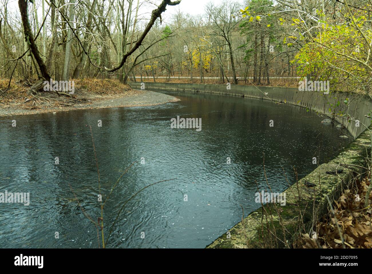 Concrete retaining wall guiding the river to a Northerly path Stock ...