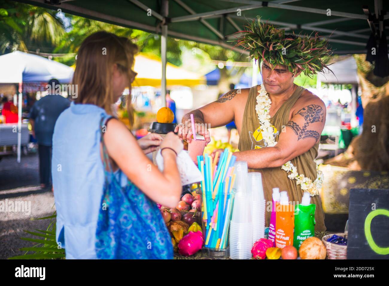 Buying a fresh fruit smoothie at Rarotonga Saturday Market (Punanga Nui ...
