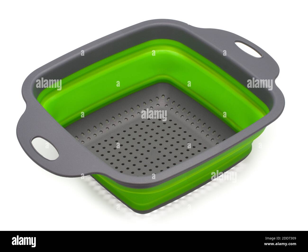 Colander, plastic kitchen utensils on white background Stock Photo - Alamy