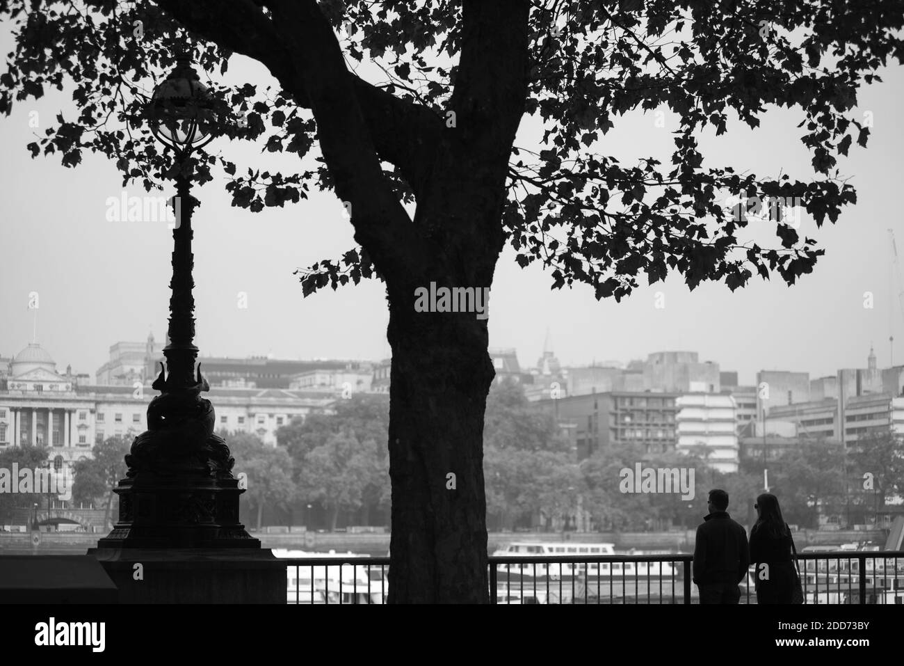 Couple admiring the Thames view from South Bank, London, England Stock ...