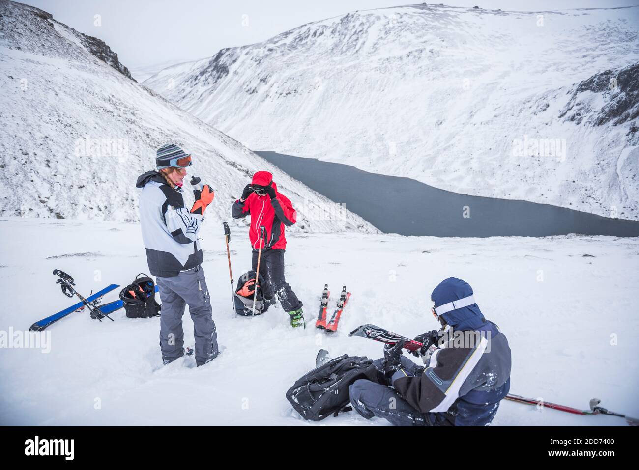 Ski touring at Loch Avon on the River Avon, Cairngorms National Park ...