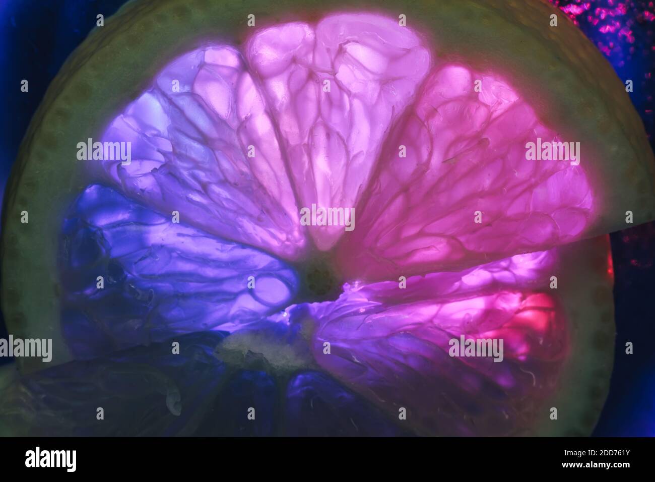 Close up beautiful abstract multi colored lemon on background texture ...