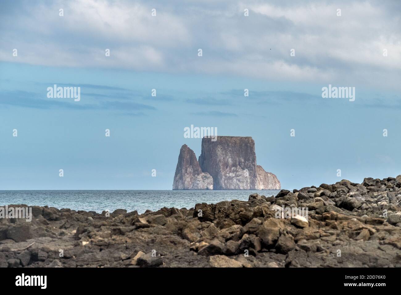 Kicker Rock island seen from San Cristobal island beach Stock Photo - Alamy