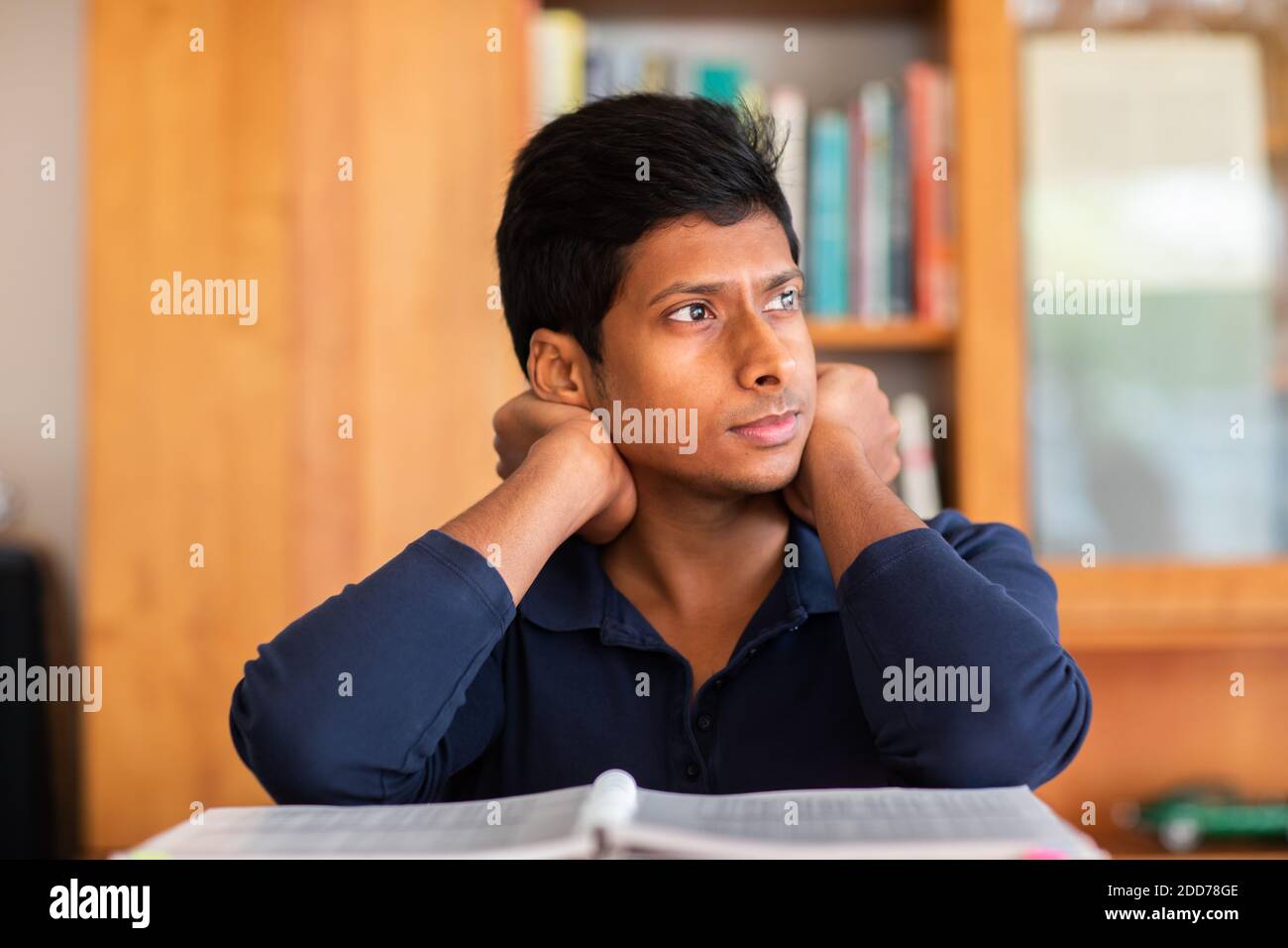 young man student learning in a room Stock Photo - Alamy